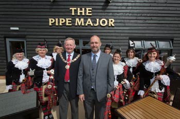Dagenham Girl Pipers celebrate the new Pipe Major!
